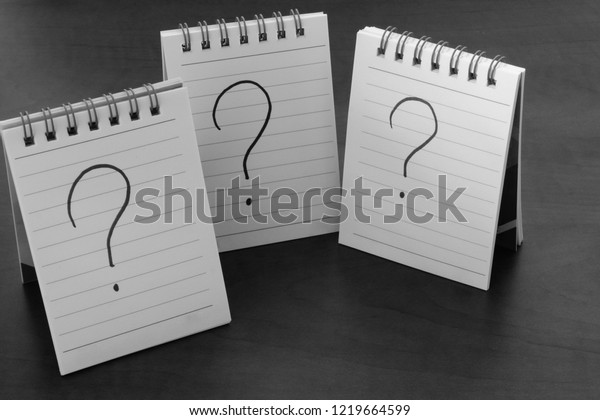 White Notebooks Paper Question Marks On Stock Photo 1219664599 ...