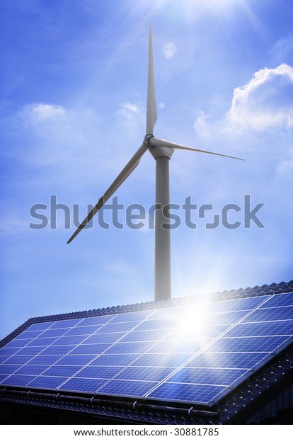 Windmill Behind Solar Panel On Roof Stock Photo (Edit Now) 30881785