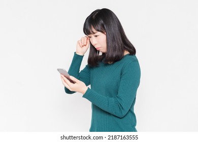 Woman Crying While Using Smartphone Stock Photo 2187163555 | Shutterstock