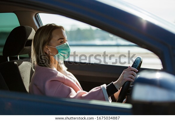 Woman Protective Mask Driving Car On Stock Photo (Edit Now) 1675034887 Woman Protective Mask Driving Car On Stock Photo (Edit Now) 1675034887
