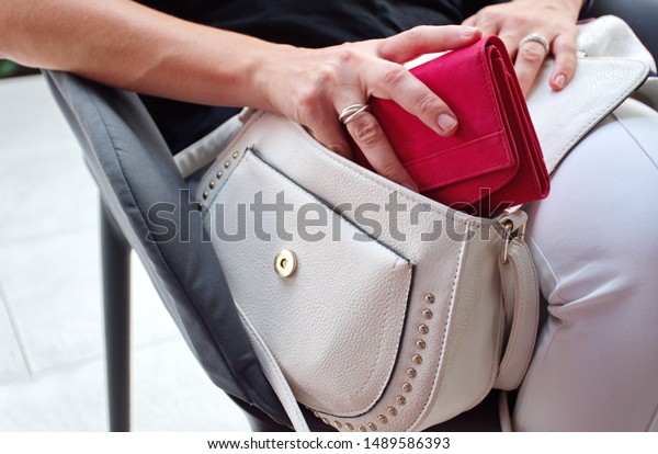 Womans Hand Pulling Out Red Wallet Stock Photo 1489586393 | Shutterstock