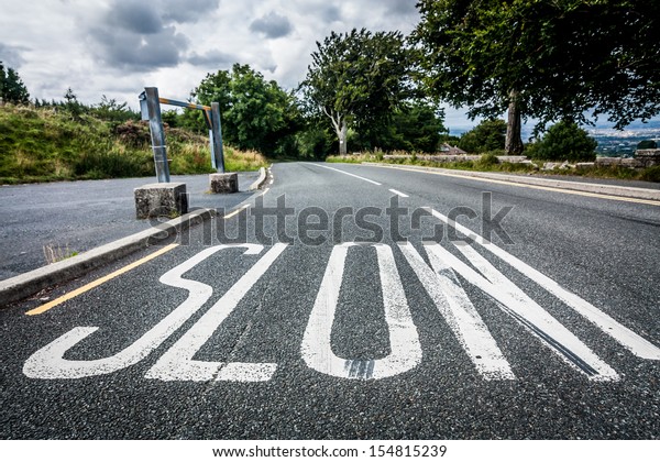 Worded Marking Slow Painted On Road Stock Photo 154815239 | Shutterstock Worded Marking Slow Painted On Road Stock Photo 154815239 | Shutterstock