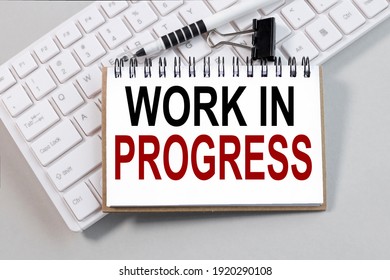 Work Progress Text On White Paper Stock Photo 1920290108 | Shutterstock
