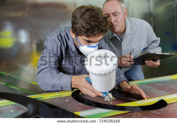 Worker Apprentice Learning Spray Painting Stock Photo 724038268 ...
