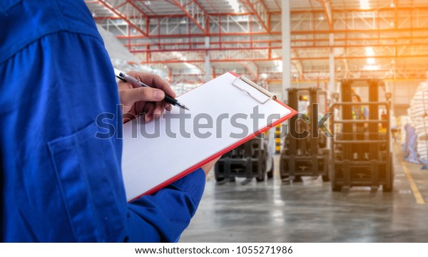 Worker Checking Document Front Forklift Warehouse Stock Photo (Edit Now ...
