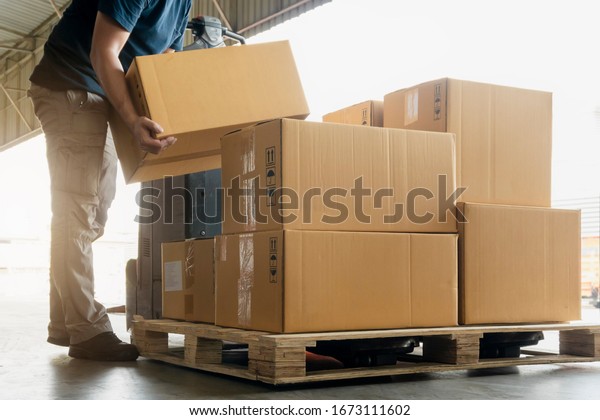 Worker Courier Lifting Package Boxes Stacking Stock Photo 1673111602 ...