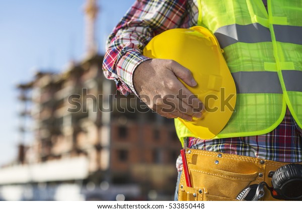 Worker Holding Hard Hat Close Shot Stock Photo (Edit Now) 533850448