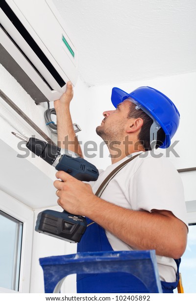 Worker Installing Air Conditioning Unit Closeup Stock Photo (Edit Now ...
