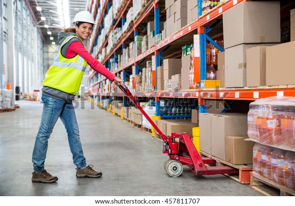 Worker Pushing Trolley Boxes Warehouse Stock Photo 457811707 | Shutterstock