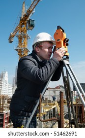 Foto Stok Worker Surveyor Measuring Distances Elevations Directions ...