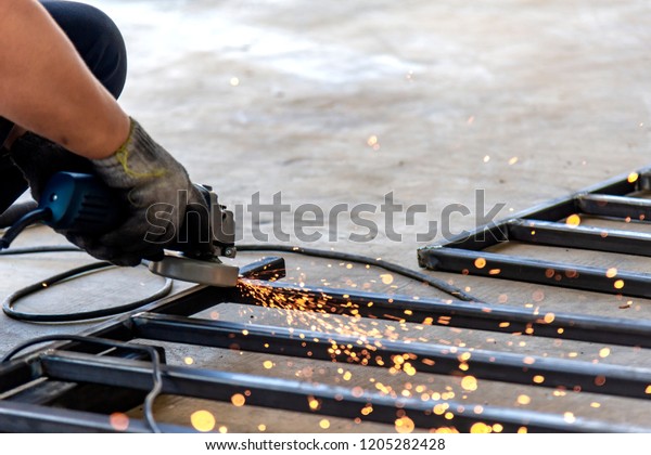 Worker Use Hand Grinder Machine Grinding Stock Photo 1205282428 ...