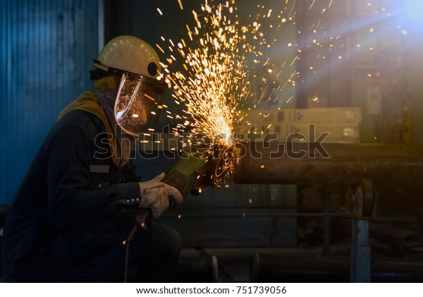 Worker Using Electric Wheel Grinding On Stock Photo 751739056 ...