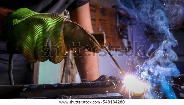 Worker Welding Iron Stock Photo (Edit Now) 548184280