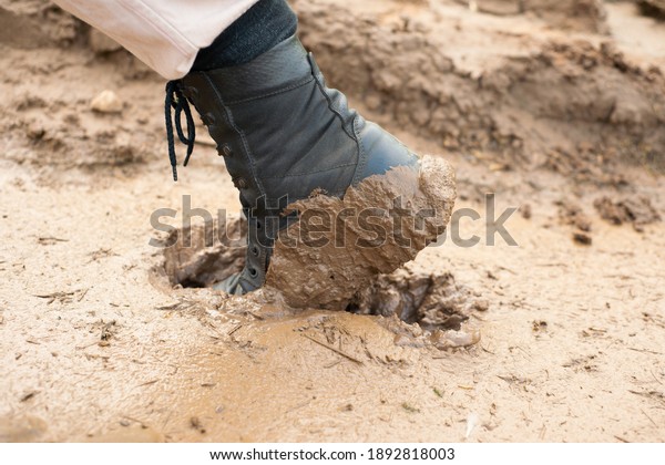 Workers Black Boot Stuck Mud Stock Photo (Edit Now) 1892818003