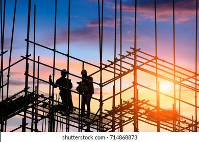 Workers Construction Site Sunset Stock Photo (Edit Now) 714874054