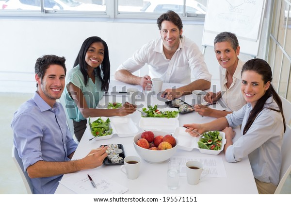 Workers Smile Camera While Eating Healthy Stock Photo (Edit Now) 195571151