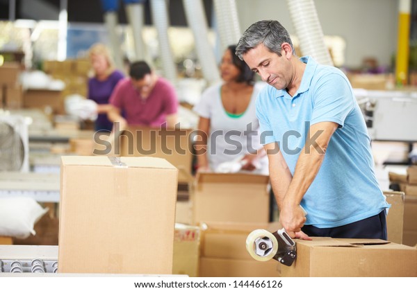 Workers Warehouse Preparing Goods Dispatch Stock Photo (Edit Now) 144466126