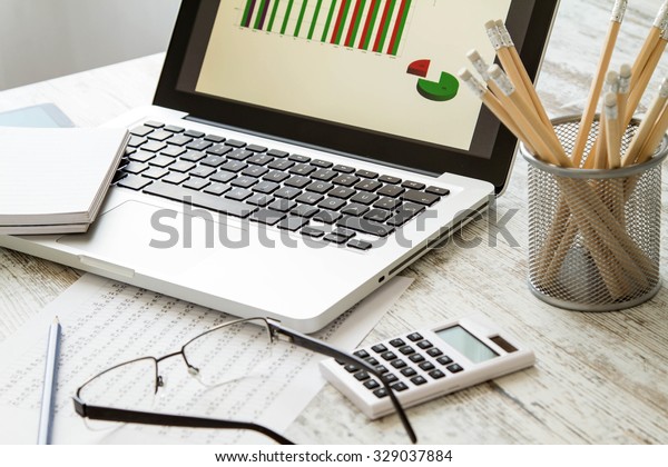 Working Analyzing Graphics Doing Calculations ภาพสต็อก 329037884 ...