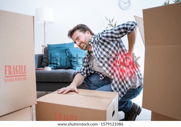 Wrong Heavy Weight Boxes Lifting Painful Stock Photo 1579121086 ...