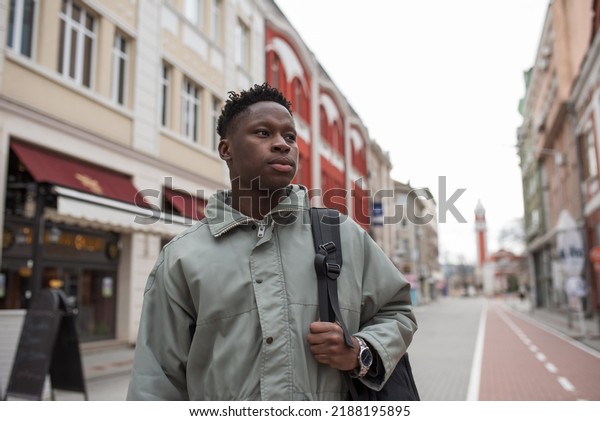 Young African Guy Walking Down Street Stock Photo 2188195895 | Shutterstock