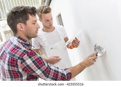 176 Apprentice plasterer Stock Photos, Images & Photography | Shutterstock