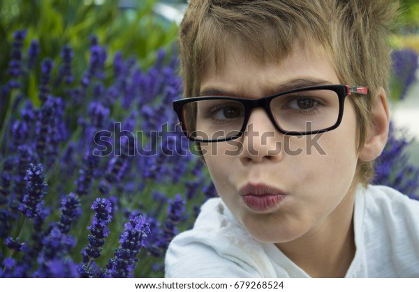Young Boy Making Funny Doubtful Face Stock Photo 679268524 | Shutterstock