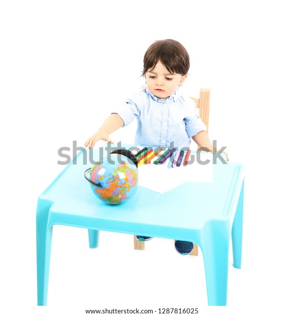 Young Boy Sitting Down Table World Stock Photo 1287816025 | Shutterstock