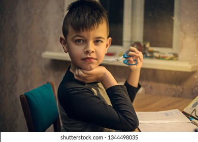 Young Boy Sitting Table Doing His Stock Photo 1344498035 | Shutterstock