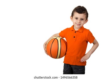 Young Boy Smiling While Playing Basketball Stock Photo 1496566358 ...