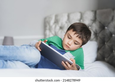 Young Boy Using Tablet Playing Game Stock Photo 2148278949 | Shutterstock