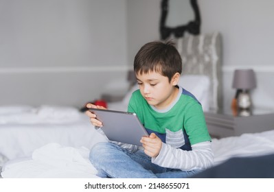 Young Boy Using Tablet Playing Game Stock Photo 2148655071 | Shutterstock
