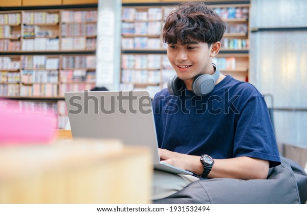 Young Collage Student Using Computer Mobile Stock Photo 1931532494 ...