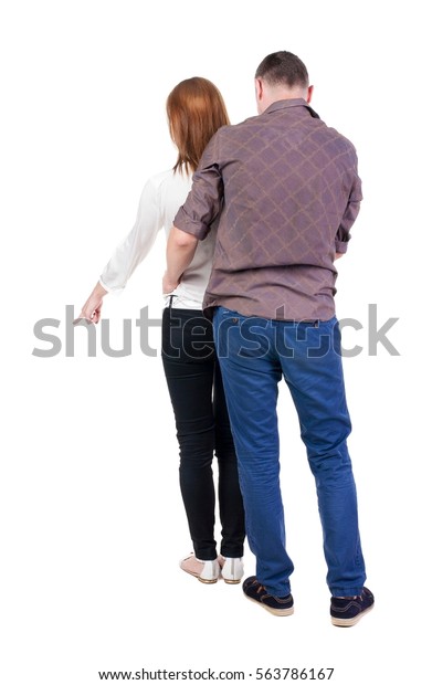 young couple pointing. Back view. Rear view people collection. backside ...