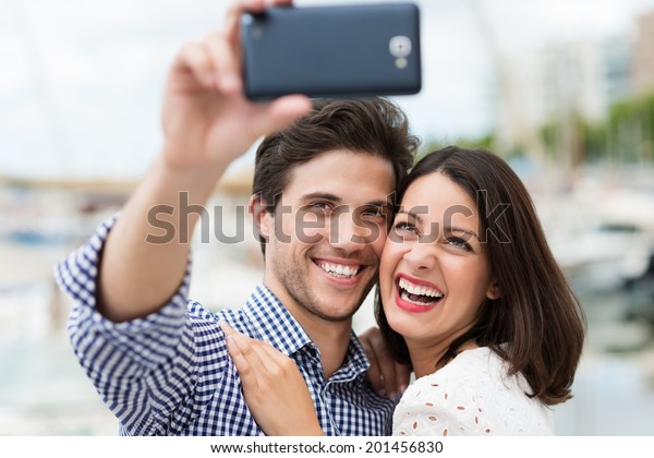 Young Couple Taking Self Portrait Laughing Stock Photo 201456830 ...