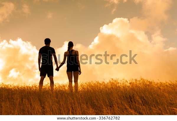 Young Couple Watching Sunset Stock Photo (Edit Now) 336762782 Young Couple Watching Sunset Stock Photo (Edit Now) 336762782