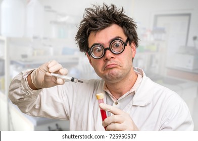Young Crazy Scientist Performing Experiments Laboratory Stock Photo ...