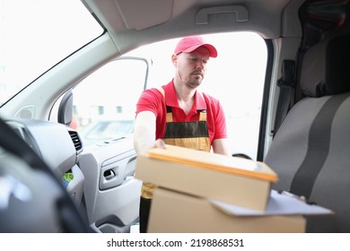 Young Delivery Man Loading Boxes Into Stock Photo 2198868531 | Shutterstock