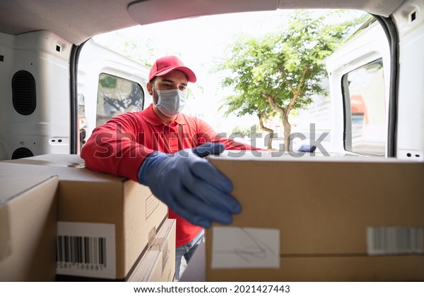 Young Delivery Man Loading Boxes Van Stock Photo 2021427443 | Shutterstock