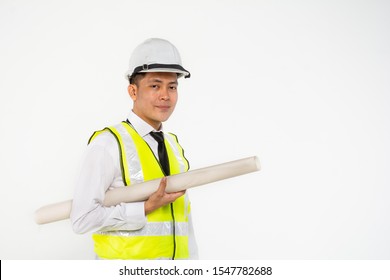 Young Engineer Smiling While Holding Construction Stock Photo ...