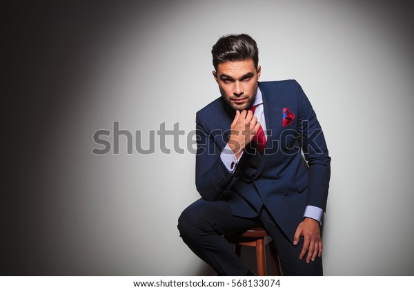 Young Gentleman Thinking While Sitting On Stock Photo 568133074 ...