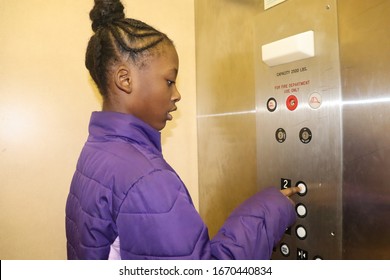 Young Girl Pushing Elevator Button Stock Photo 1670440834 | Shutterstock