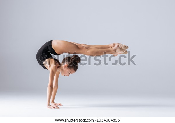 Young Gymnast Girl Stretching Training Stock Photo (Edit Now) 1034004856 Young Gymnast Girl Stretching Training Stock Photo (Edit Now) 1034004856