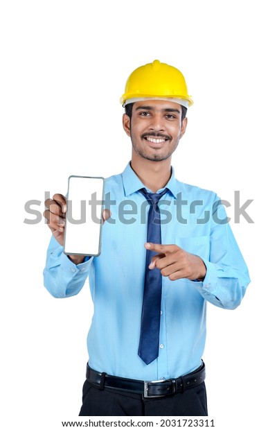 Young Indian Engineer Construction Worker Showing Stock Photo ...