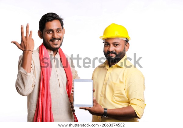 Young Indian Engineer Construction Worker Showing Stock Photo ...