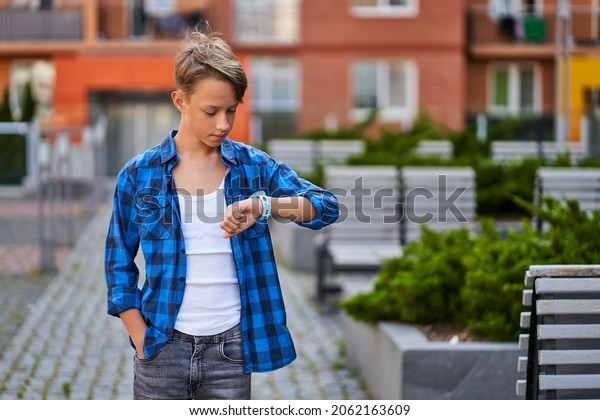 Young Kid Boy Using Blue Smartwatch Stock Photo 2062163609 | Shutterstock