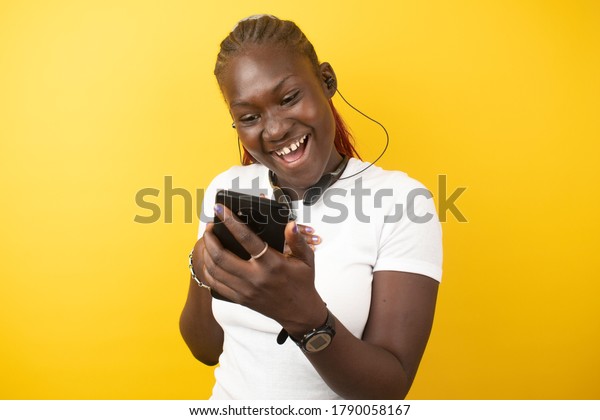 Young Lady Using Her Smartphone Wearing Stock Photo (Edit Now) 1790058167