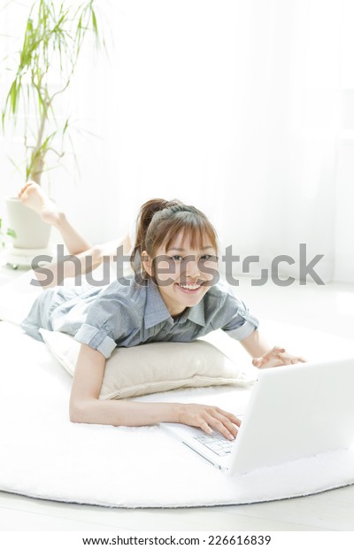 Young Lying Down Using Computer Stock Photo 226616839 | Shutterstock