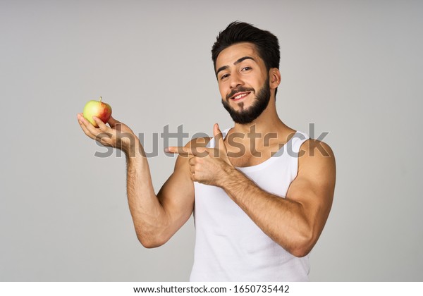 Young Man Apple Looking Camera Isolated Stock Photo 1650735442 ...