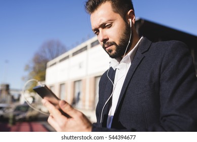 Young Man Calling Using Earphone Stock Photo 544394677 | Shutterstock
