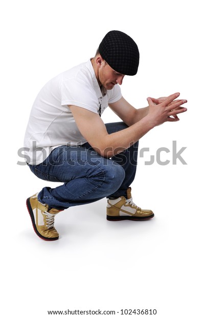 Young Man Crouching Stock Photo (Edit Now) 102436810